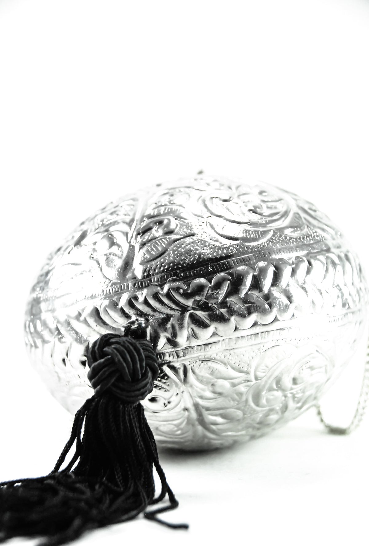 Silver Oval metal Clutch with Black Tassles